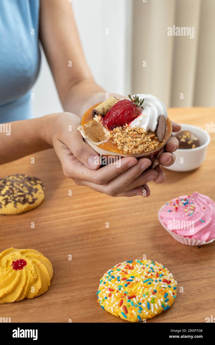 sweet dessert decorated with various toppings, cake and cookies in the ...