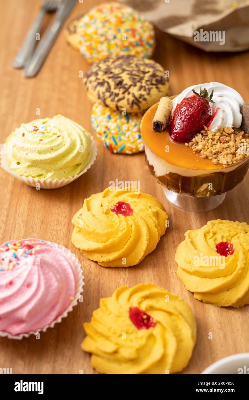 table served with exquisite desserts, gourmet pastry decoration, studio ...