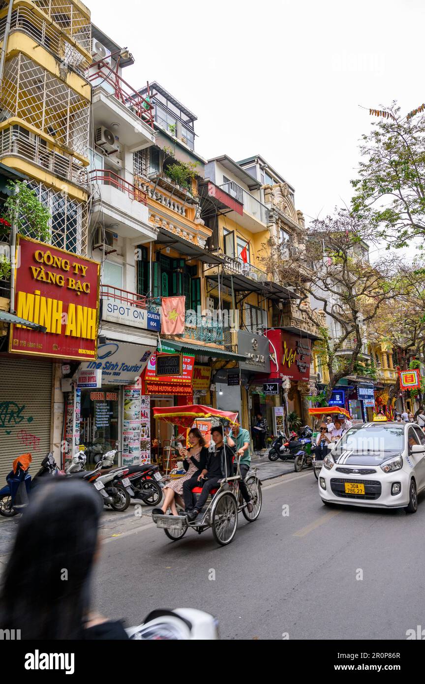 A typical street scene in downtown Hanoi with a random collection of ...