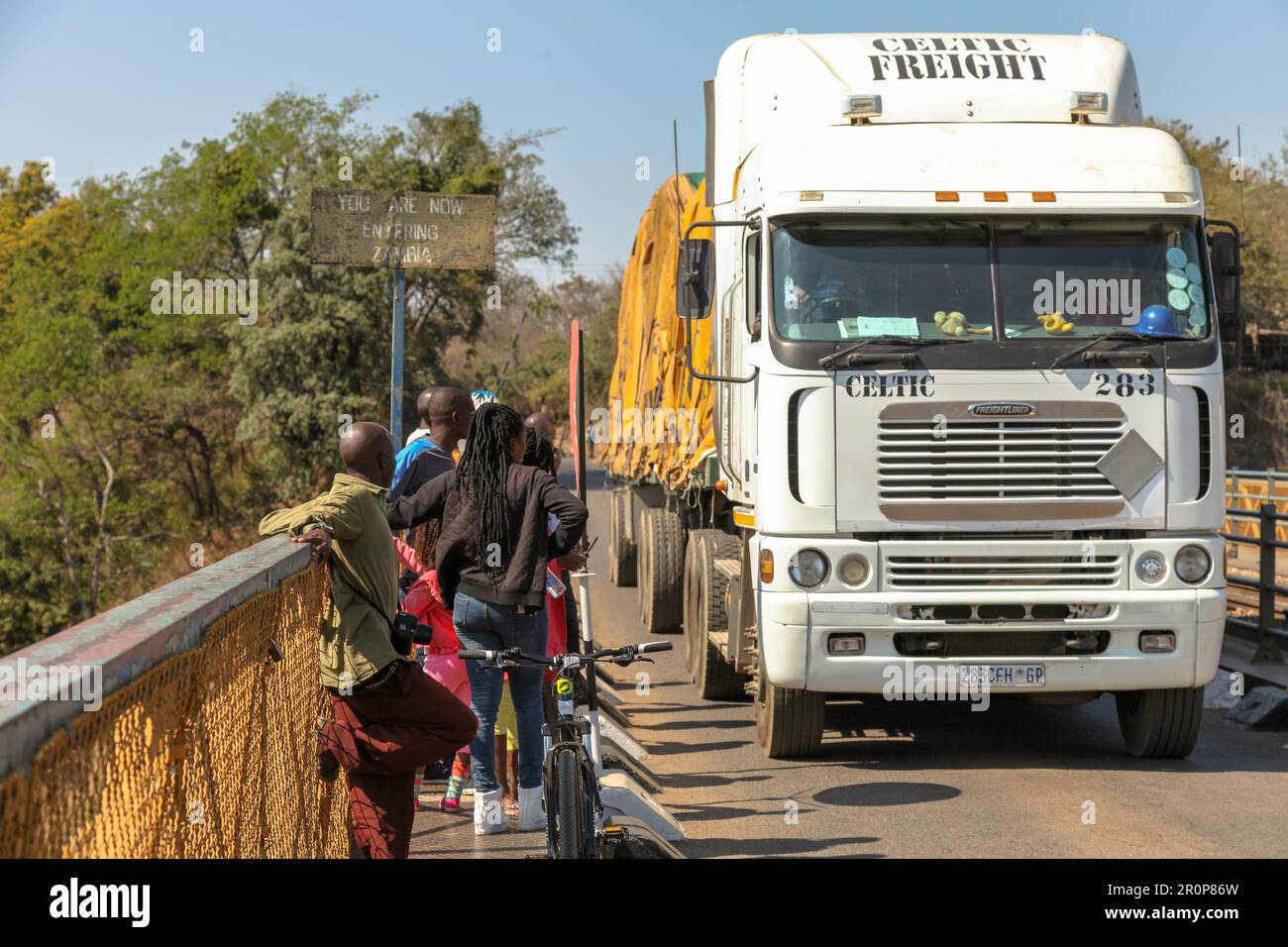 A transport truck carrying copper, a key metal, crosses from Zambia ...