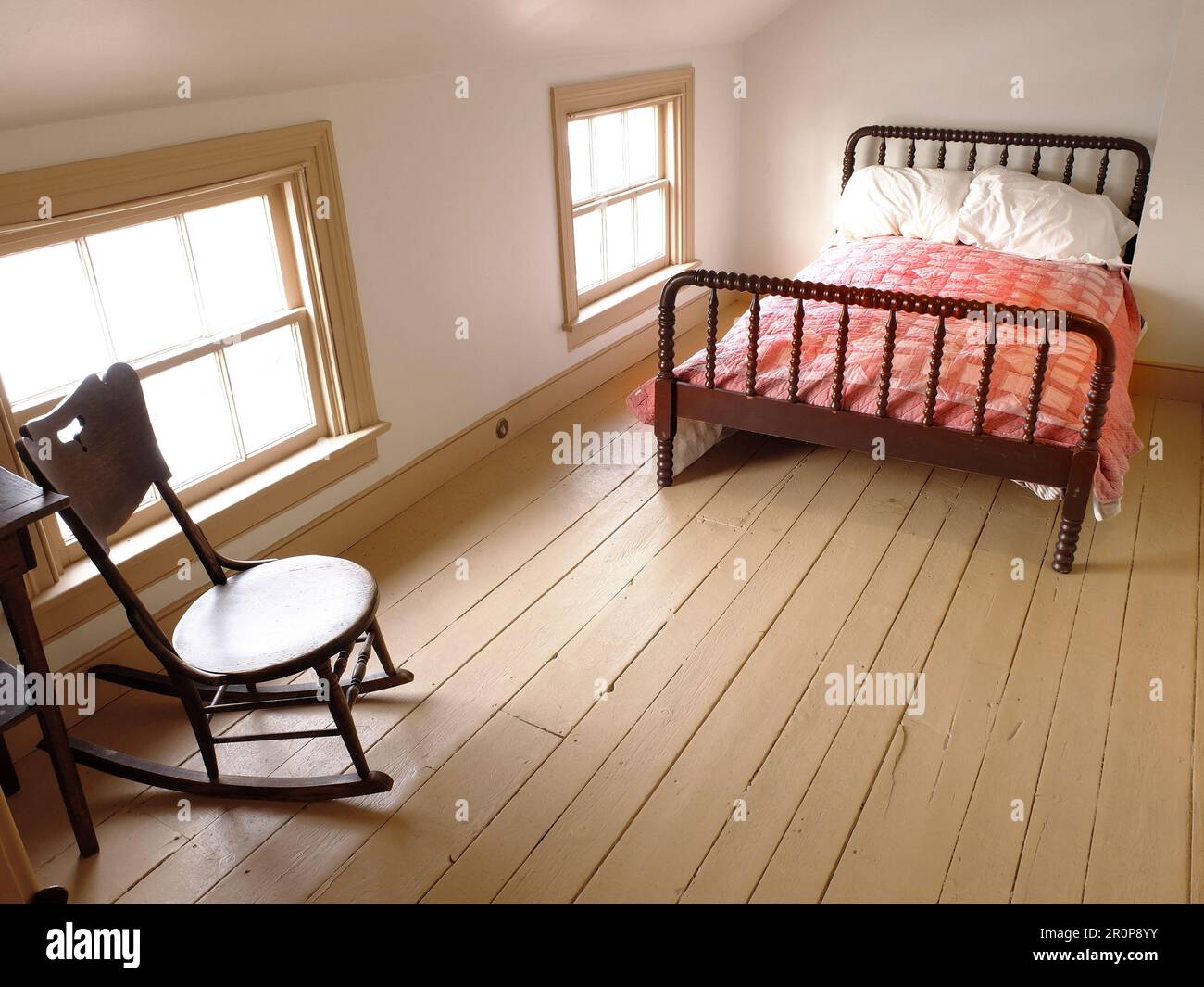 Old fashioned antique bedroom with bed headboard chair and window Stock ...