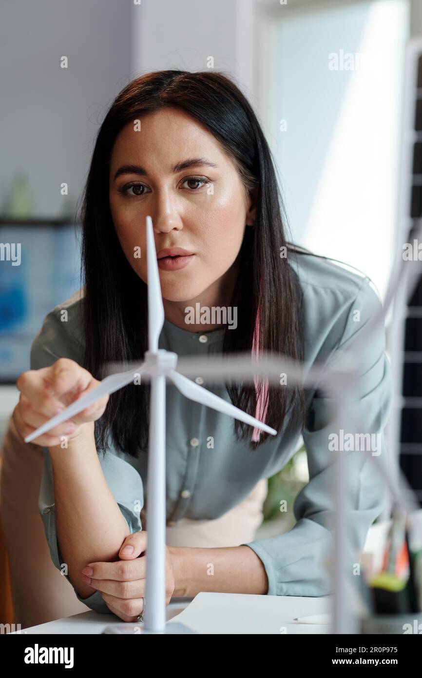 Portrait of curious woman learning more about alternative energy ...