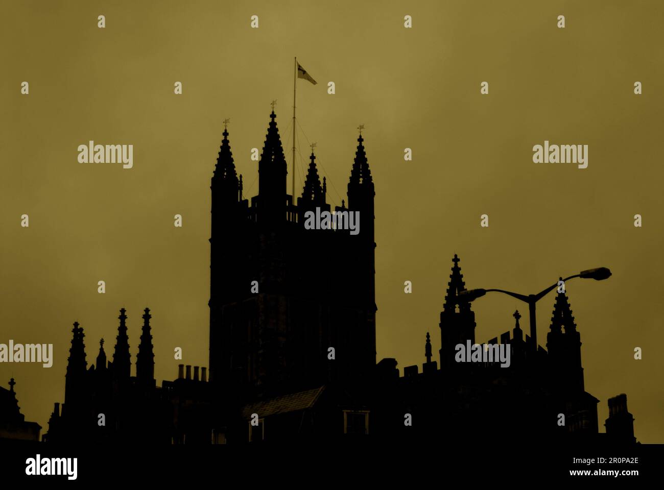 Ancient gothic church parapet silhouette in sepia tone Stock Photo - Alamy