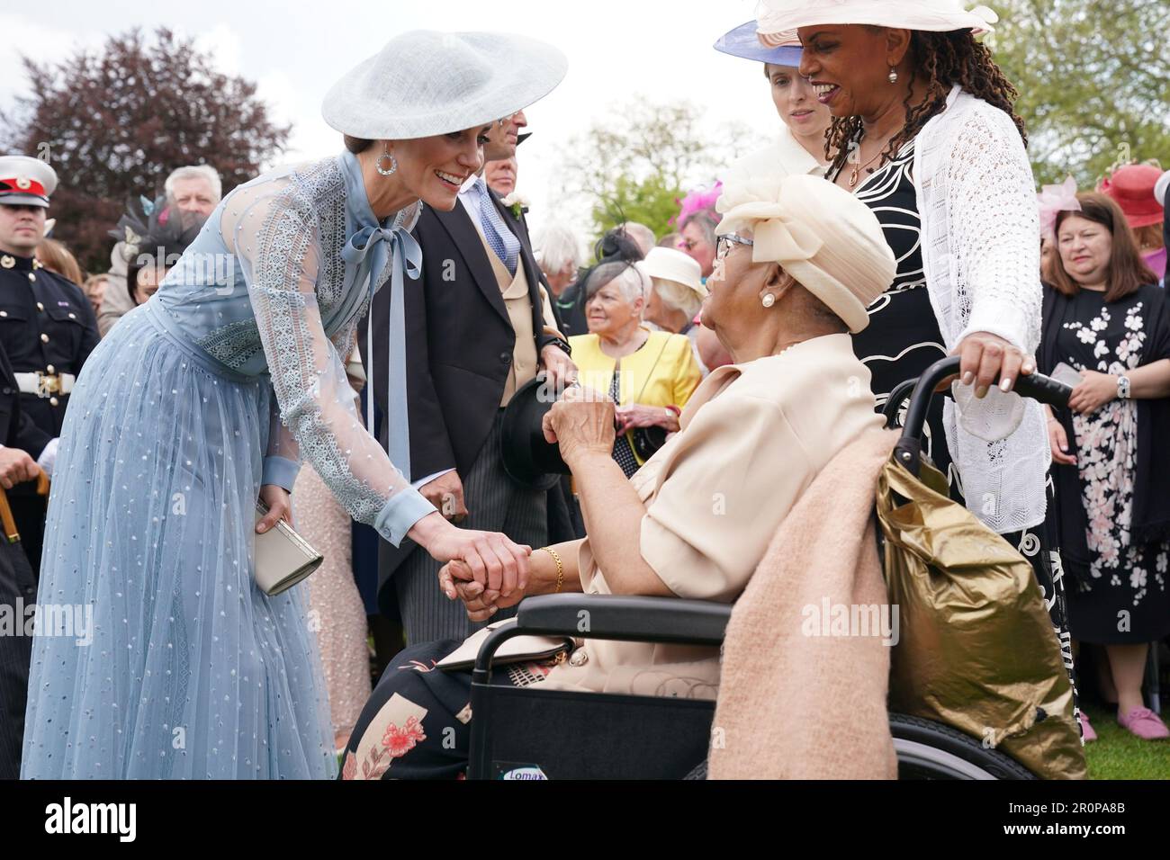 The Princess of Wales (left) speaks to Aldith Grandison, 93, and ...