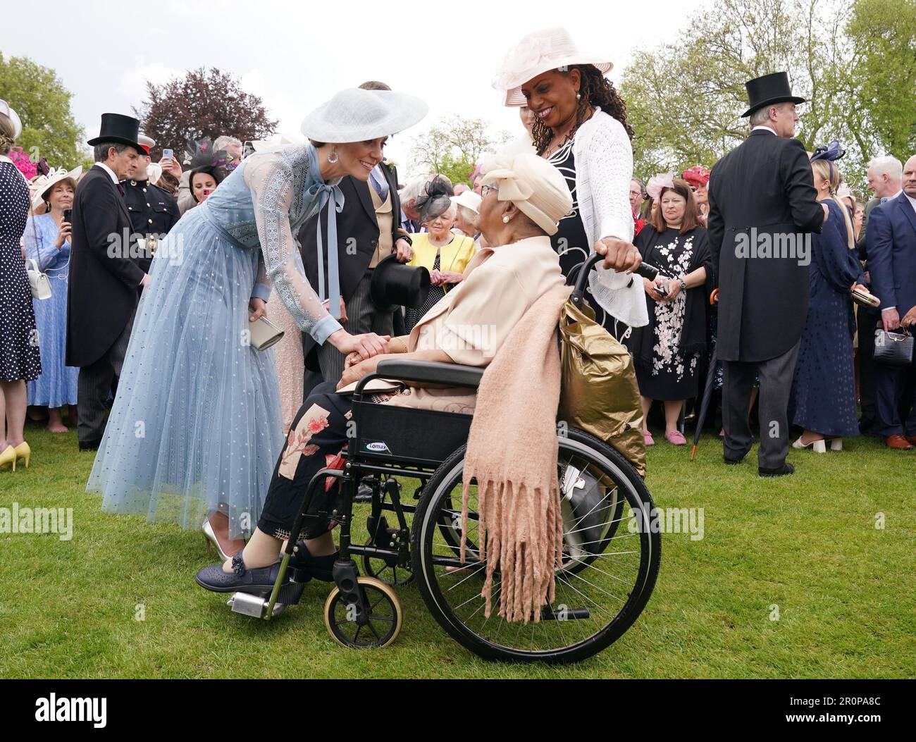 The Princess of Wales (left) speaks to Aldith Grandison, 93, and ...
