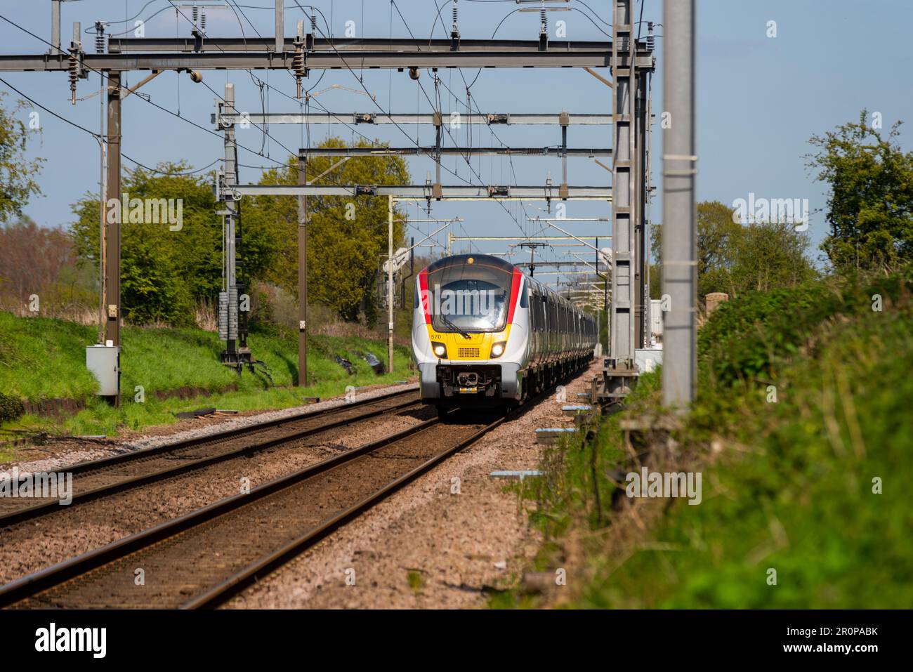 British Rail Class 720 Aventra of Greater Anglia passing through Margaretting towards London ...