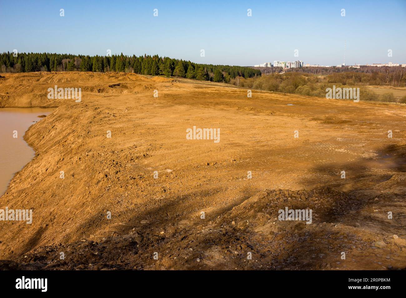 Part of the quarry filled with soil, sand pit reclamation Stock Photo ...