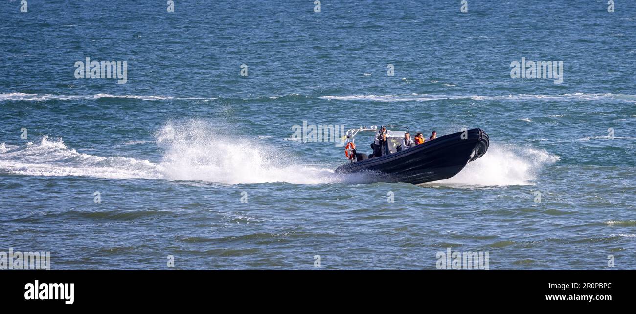 High speed ocean rib ride at West Bay, Dorset, UK on 7 May 2023 Stock ...