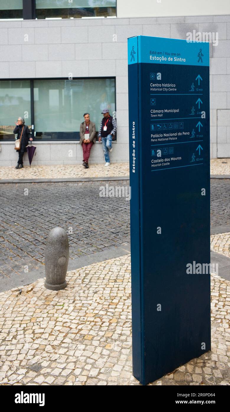 Direction information panel at Sintra railway station with guides ...