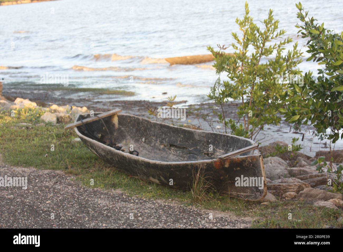 PUNTA GORDA, BELIZE - DECEMBER 28, 2008 shallow-draft Dory pulled up on ...