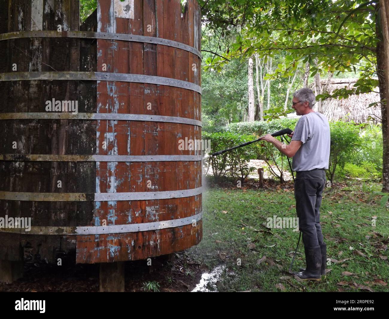 PUNTA GORDA, TOLEDO, BELIZE - NOVEMBER 1, 2012 man using a pressure ...
