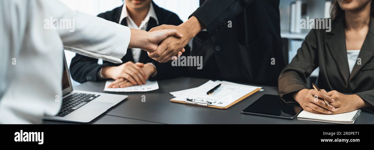 Interviewer handshaking the applicant hi-res stock photography and ...