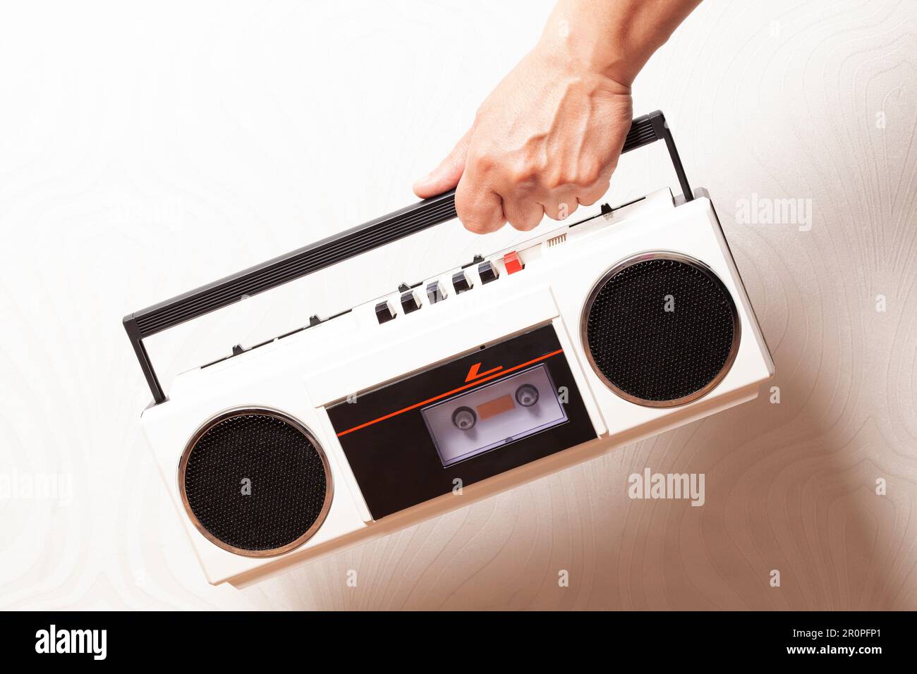 Retro portable stereo cassette recorder from 80s. in hand Stock Photo ...