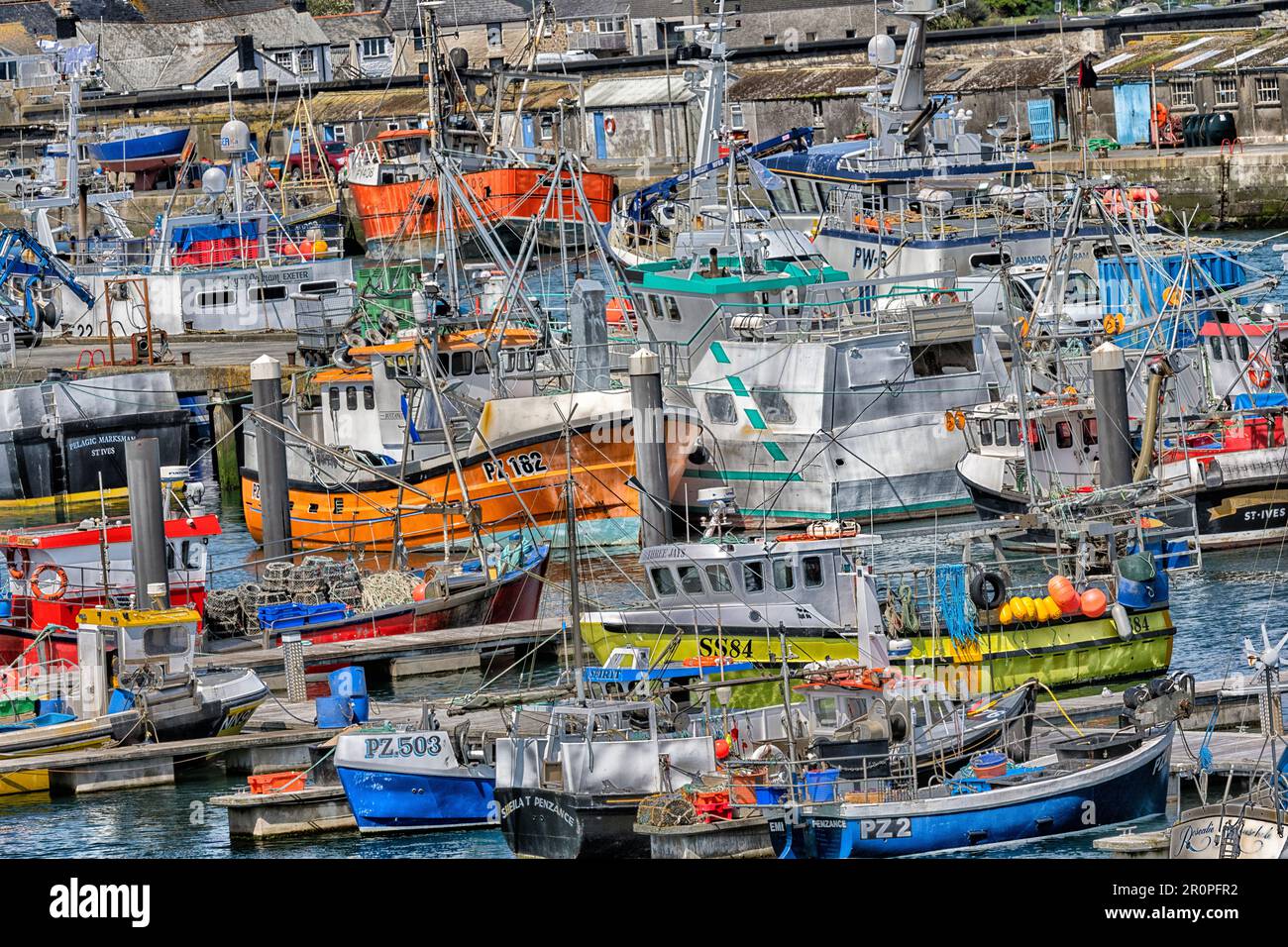 Crowded fishing boats in the harbour at Newlyn, Penzance, Cornwall, England, UK Stock Photo - Alamy