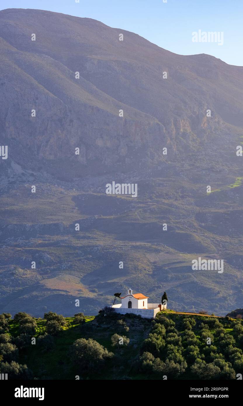 Little chapel with mountains of southern Crete Stock Photo - Alamy