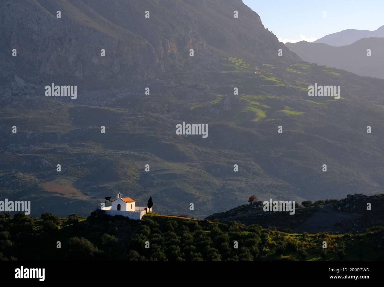Little chapel with mountains of southern Crete Stock Photo - Alamy