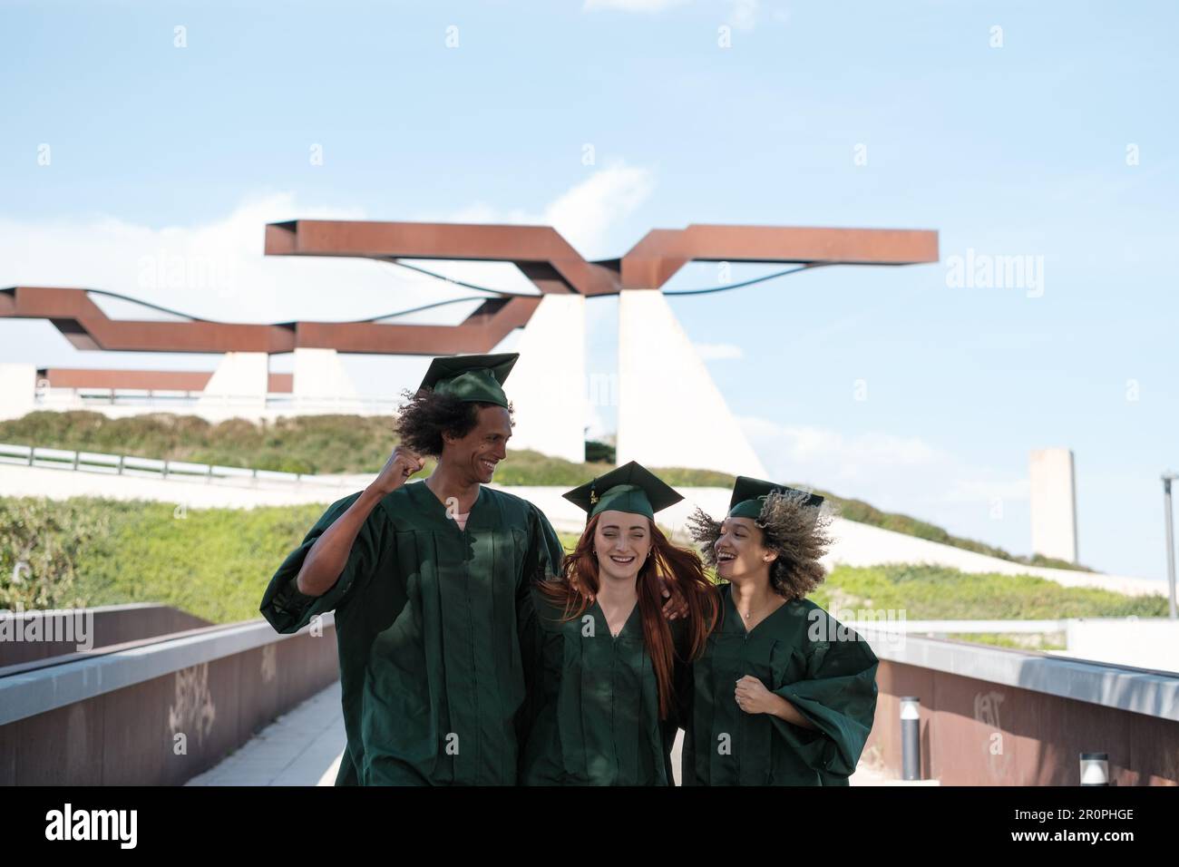 group of college graduates on graduation day happy and celebrating ...