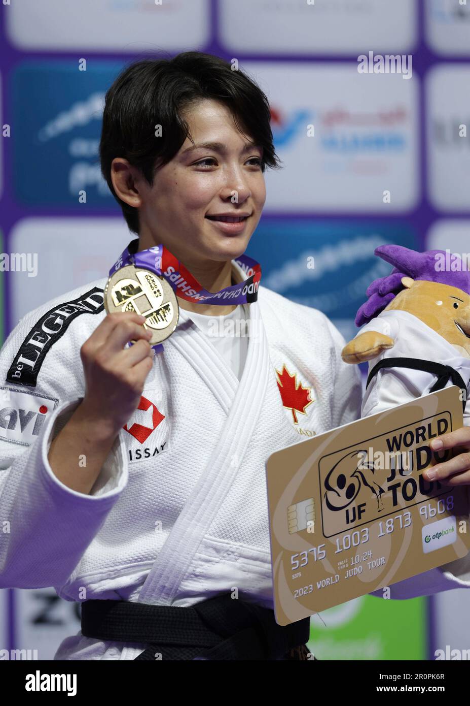 Christa Deguchi of Canada celebrates during an award ceremony of women ...