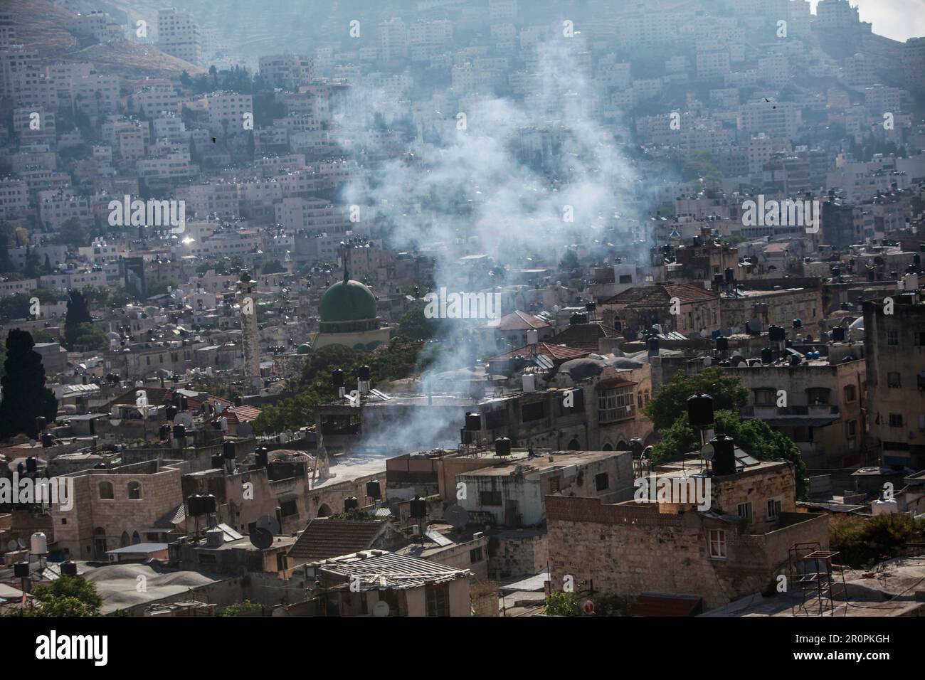 Nablus, Palestine. 09th May, 2023. Smoke rises from the old city of ...