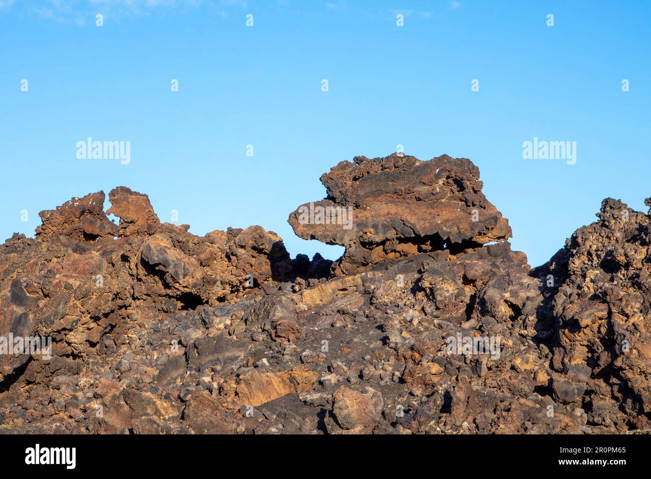 cold lava in detail in Timanfaya natiopnal park in Lanzarote looks like ...