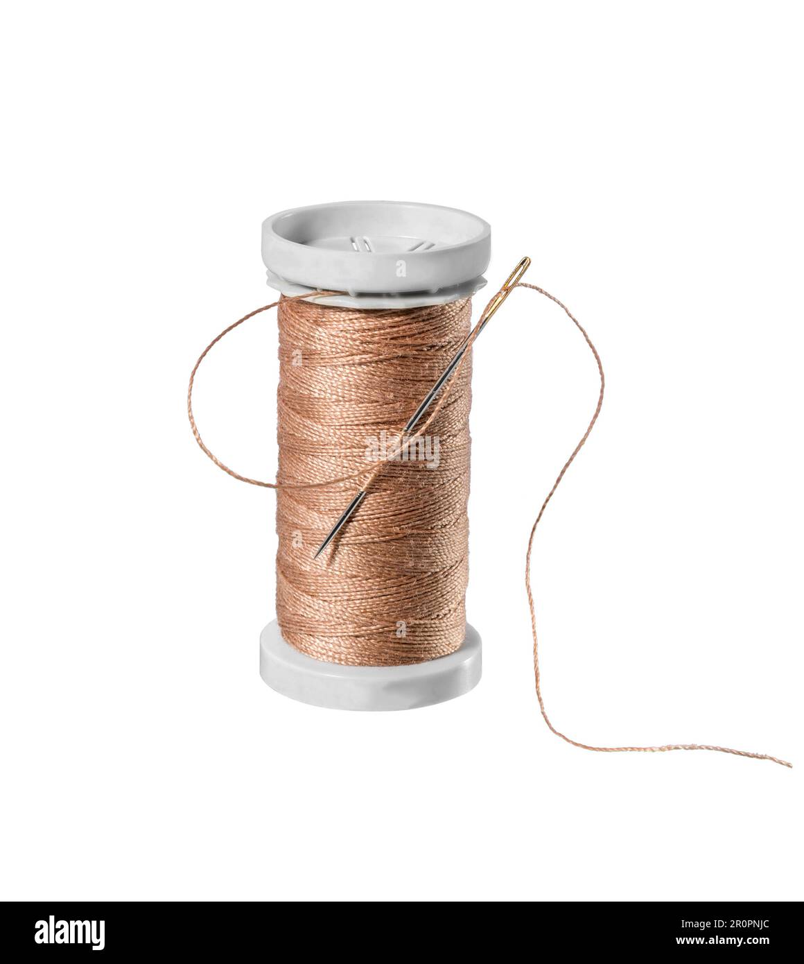 spool of thread with needle on white isolated background. Thread bobbin ...