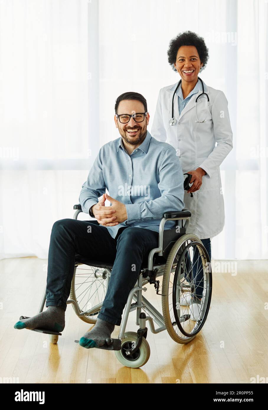 disability wheelchair doctor patient hospital medical disabled man ...