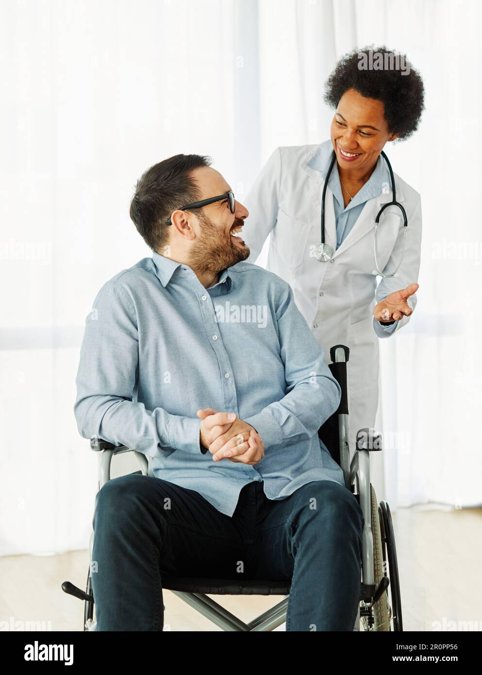 disability wheelchair doctor patient hospital medical disabled man ...