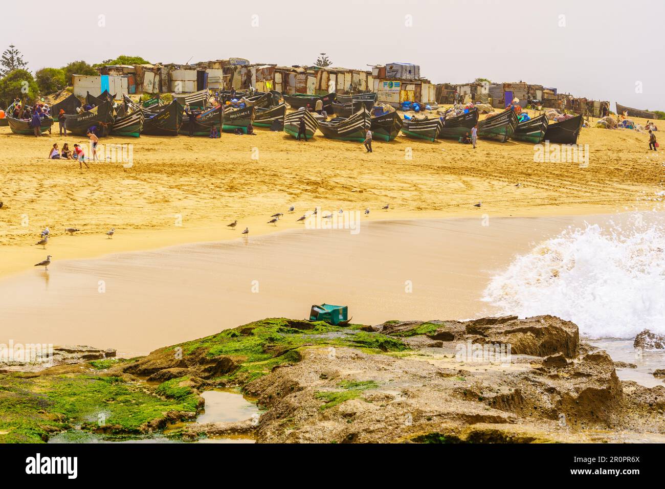 Oualidia, Morocco - April 08, 2023: Beach scene, with locals and ...