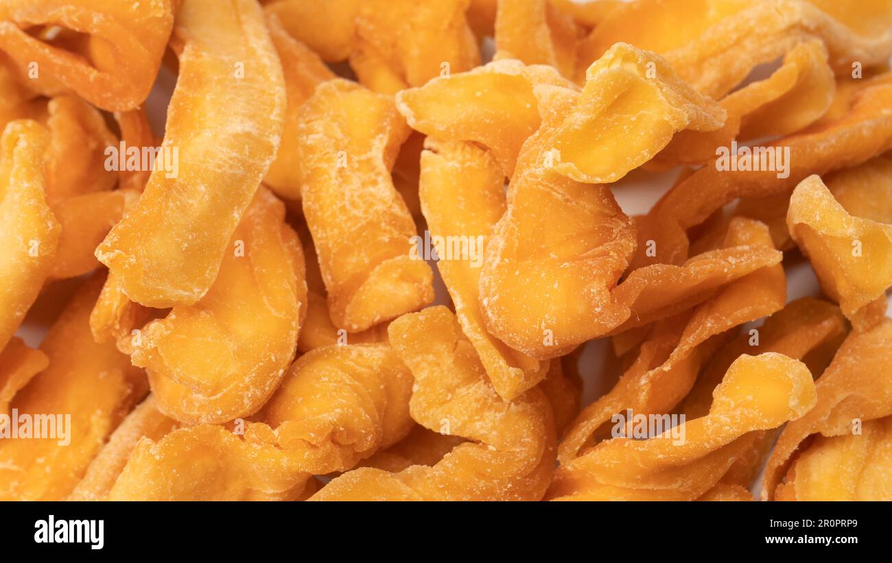 Dried melon slices isolated on a white background. Dried fruit Stock ...