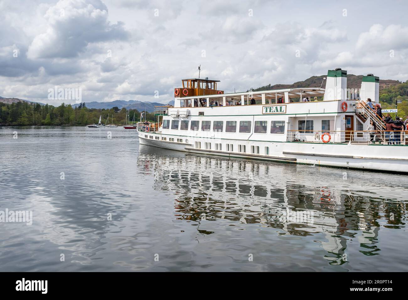 Passengers seen boarding the MV Teal steam boat to embark on a trip ...