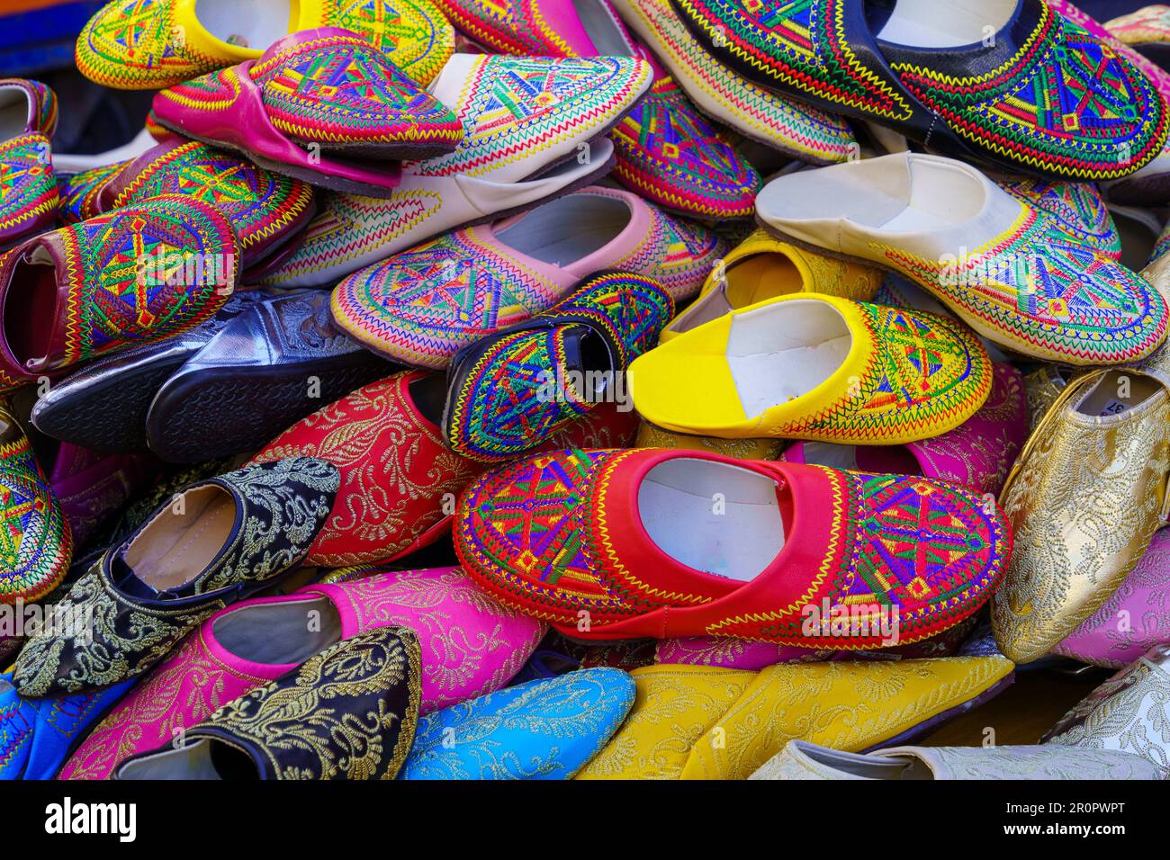 View of colorful typical shoes on sell display, in the market of the ...
