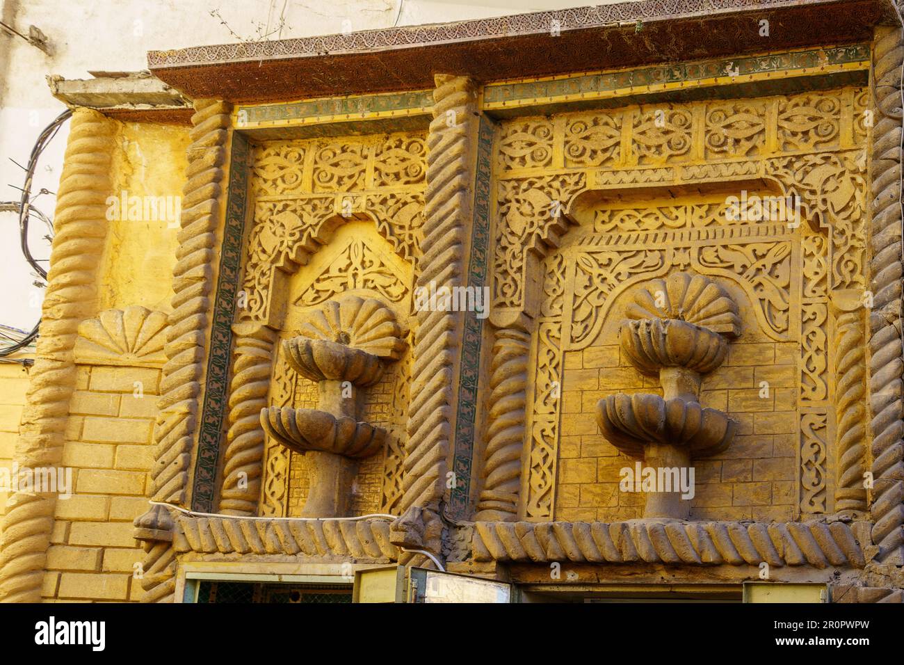 View of typical stone carvings, the wall of the Grand Mosque, in the ...