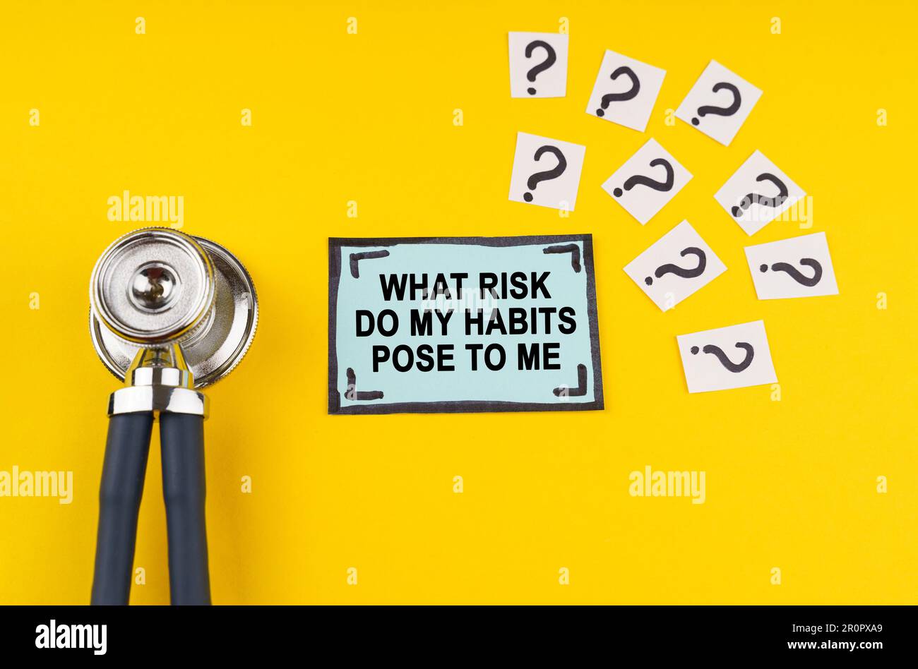 Medical concept. Question. On a yellow background a stethoscope ...