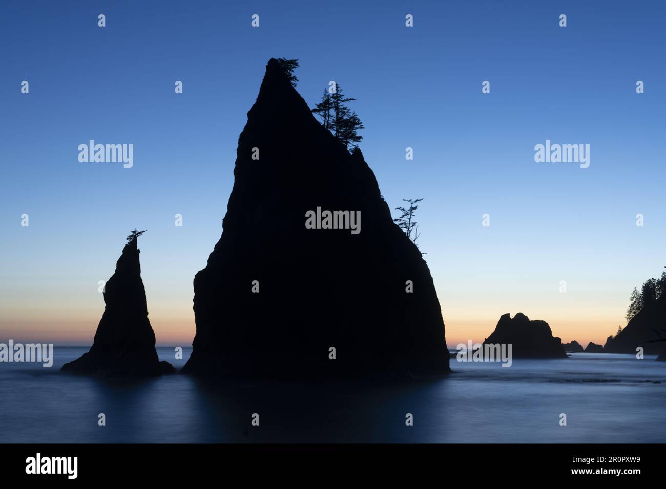 Sea stacks silhoetted against sunset, Rialto Beach, Olympic National ...