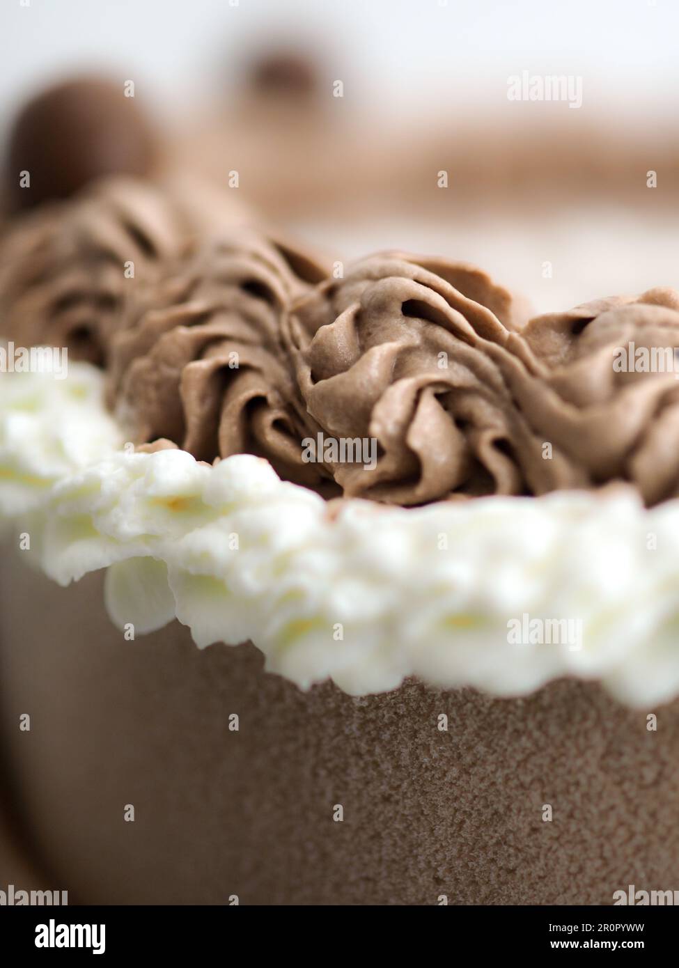 elegant beige brown frosted icing cake macro close up isolated on white ...