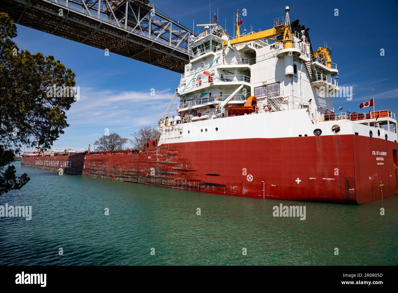 Freight ship passing under bridge # 21 in the Welland canal Port ...