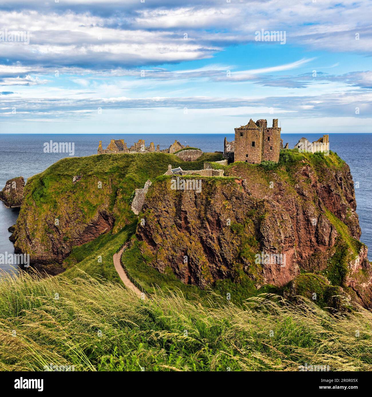 Rocky headland with castle ruins, Dunnottar Castle, coastline near ...
