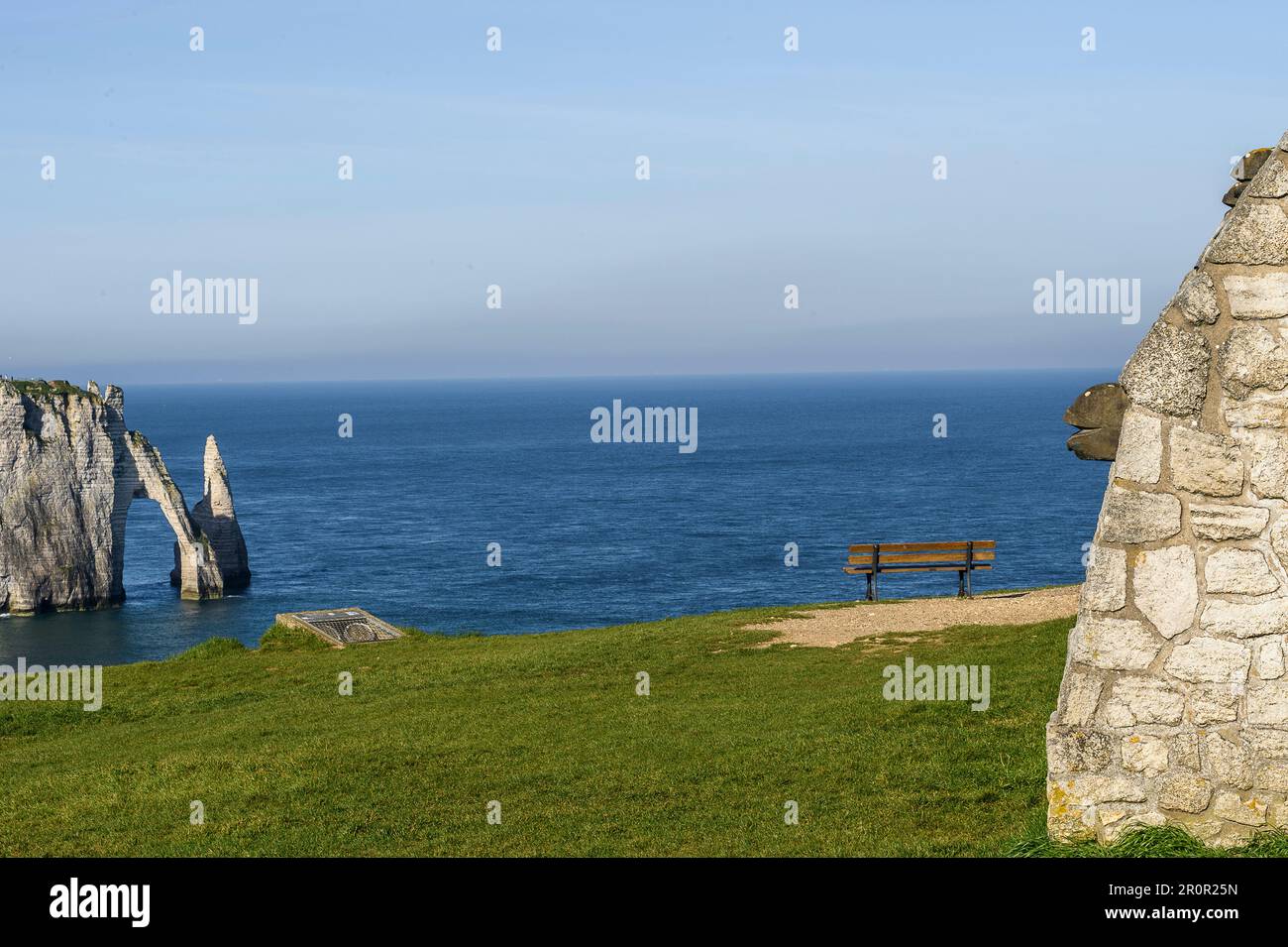 Etretat between historic city, beach of pebbles and cliffs on the cote ...