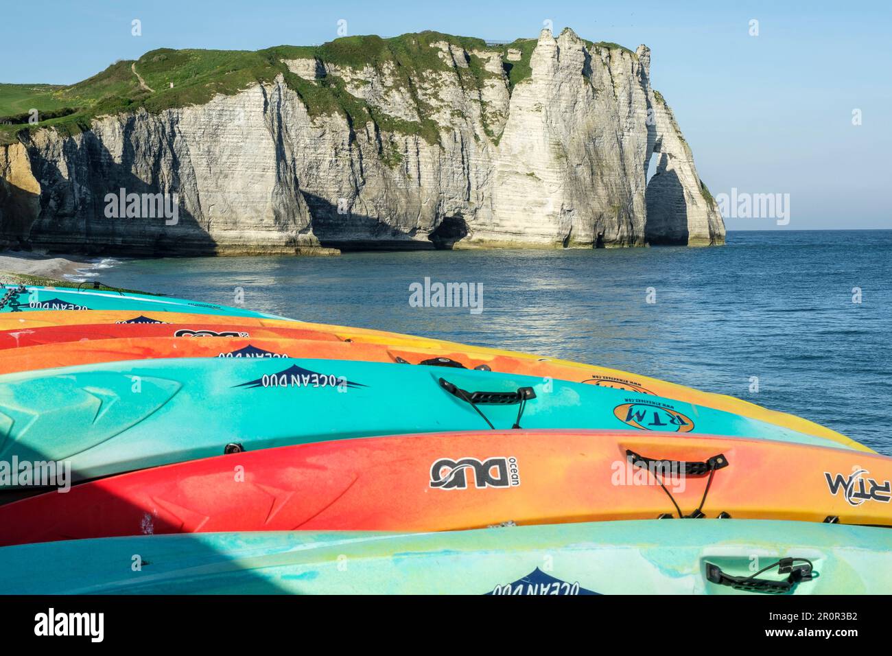 Etretat between historic city, beach of pebbles and cliffs on the cote ...