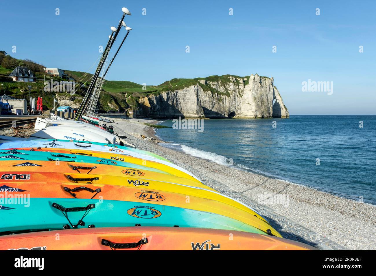 Etretat between historic city, beach of pebbles and cliffs on the cote ...