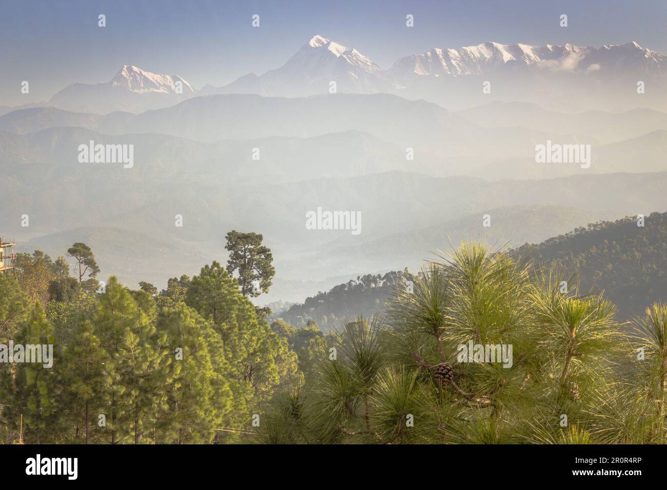 Beautiful Himalayan landscape with perspective in morning haze. Snow ...