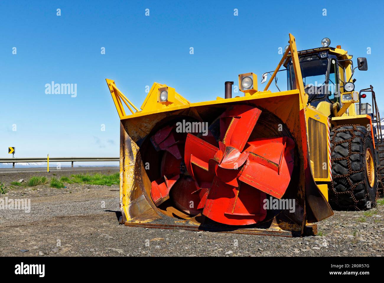 Wheel loader with snowblower and snow chains, circular road, near ...