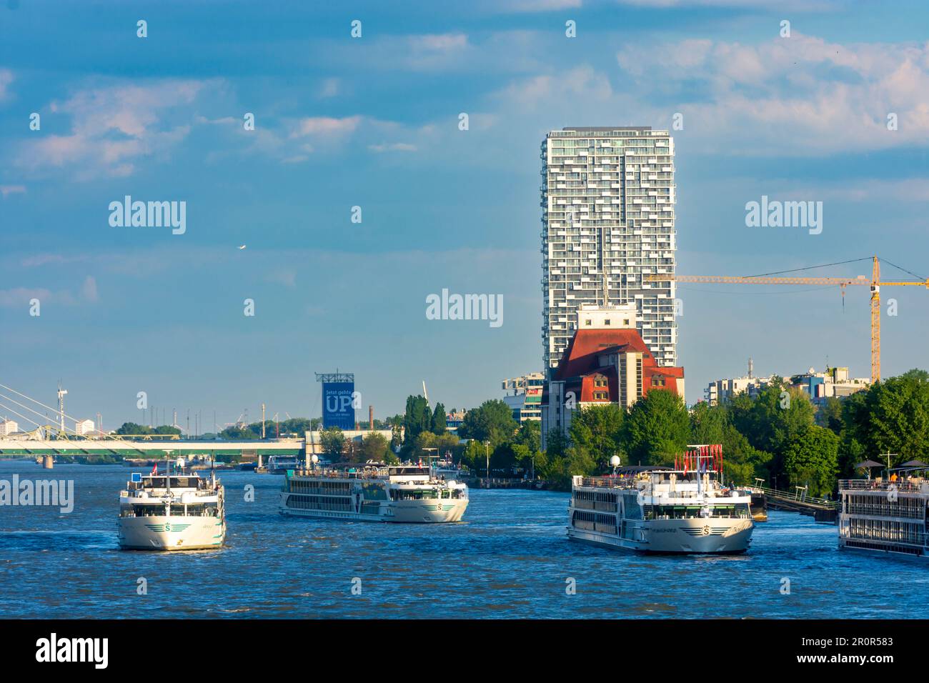 Vienna: cruise ships on river Donau (Danube), Marina Tower, bridge ...
