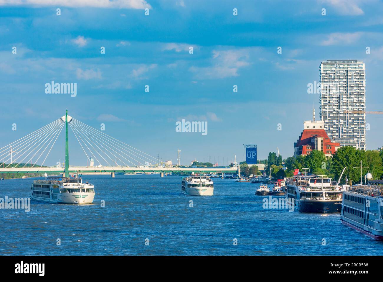Vienna: cruise ships on river Donau (Danube), Marina Tower, bridge ...