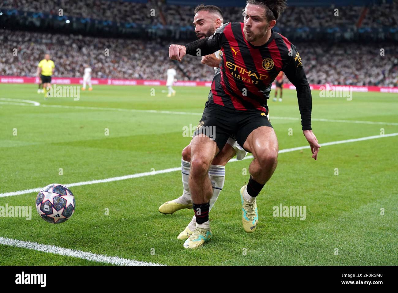 Manchester City's Jack Grealish (right) and Real Madrid's Dani Carvajal ...