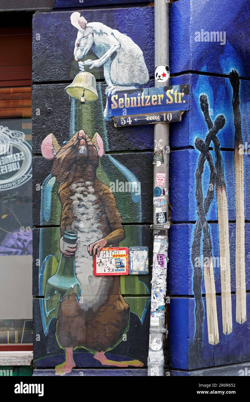 Graffiti, scene with rats, burnt matches and street sign, painted ...