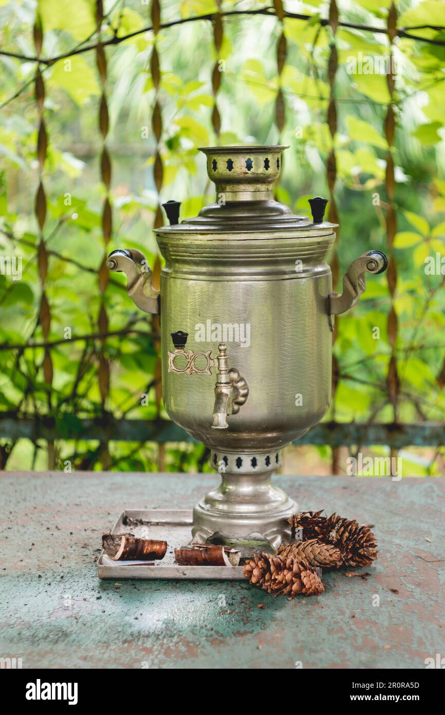 Vintage samovar - old traditional Russian kettle. Metal retro appliance ...