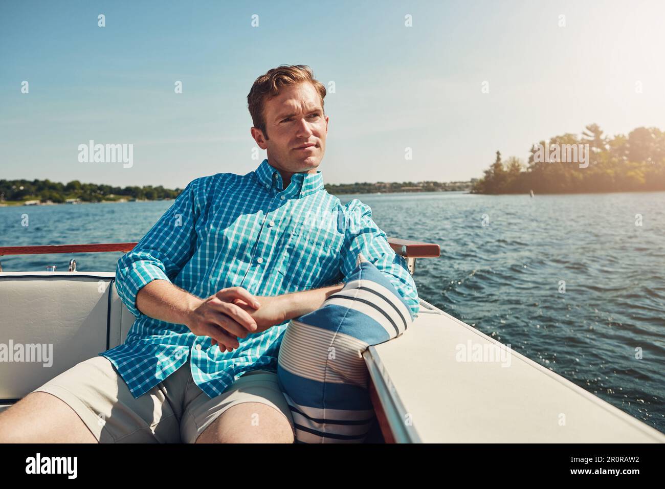 Days like these were made for cruising. a handsome young man spending ...