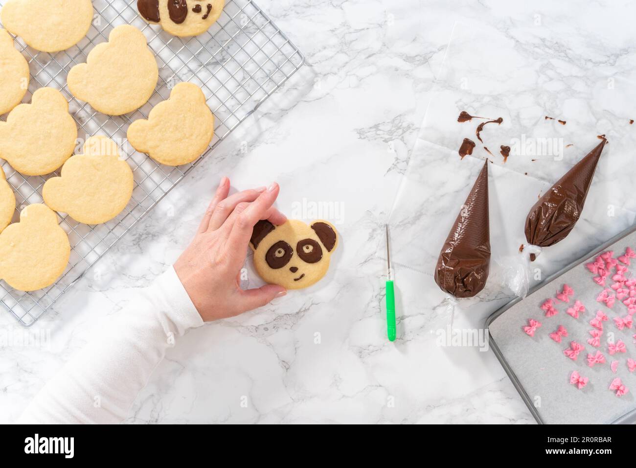Panda shaped shortbread cookies with chocolate icing Stock Photo - Alamy