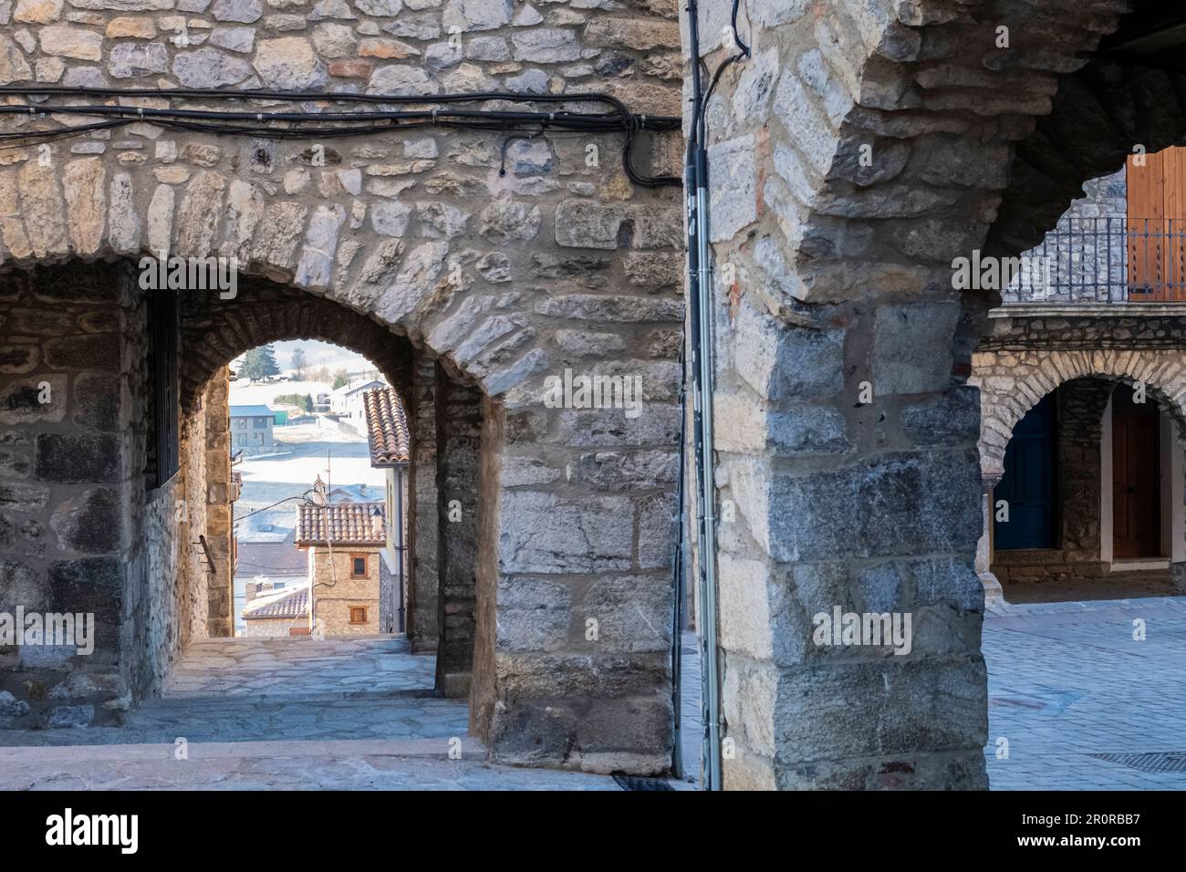 Cobble stones arch in a beautiful town architectural detail in Bellver ...